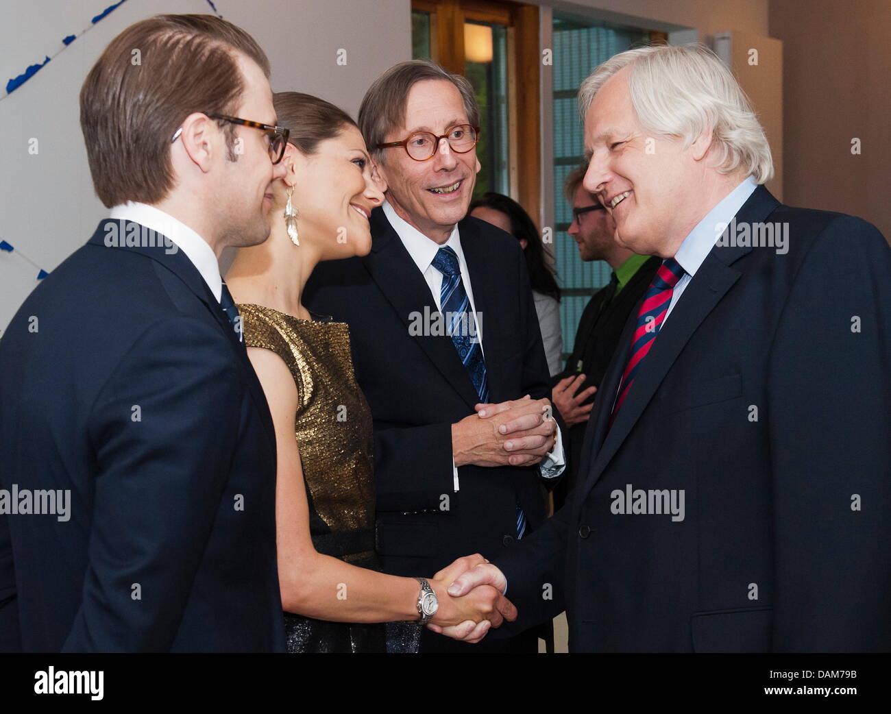 Swedish Princess Victoria (2-l) and her husband Daniel (l) stand next ...