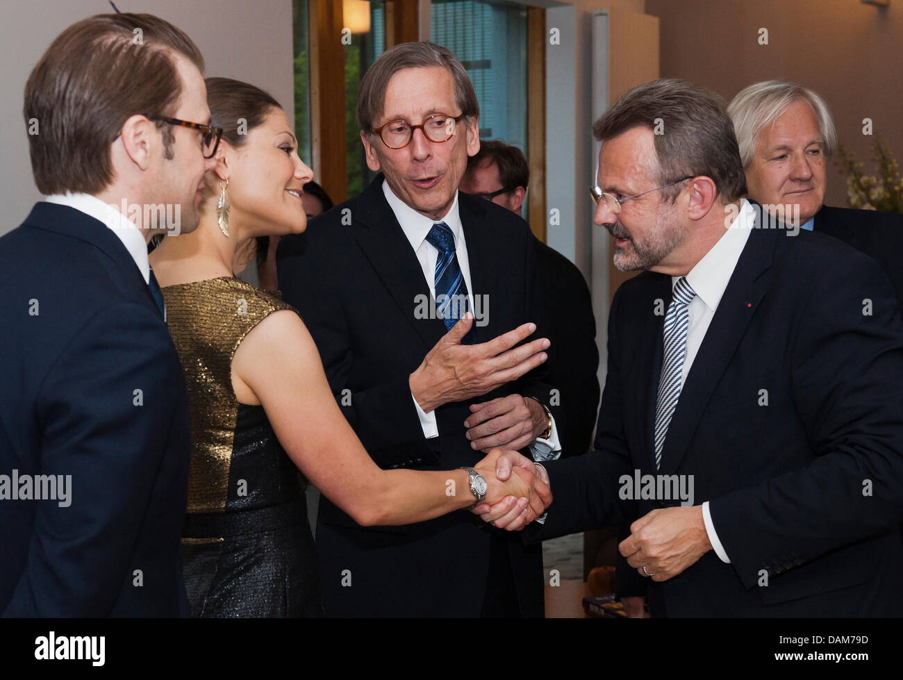 Swedish Princess Victoria (2-l) and her husband Daniel (l) stand next ...