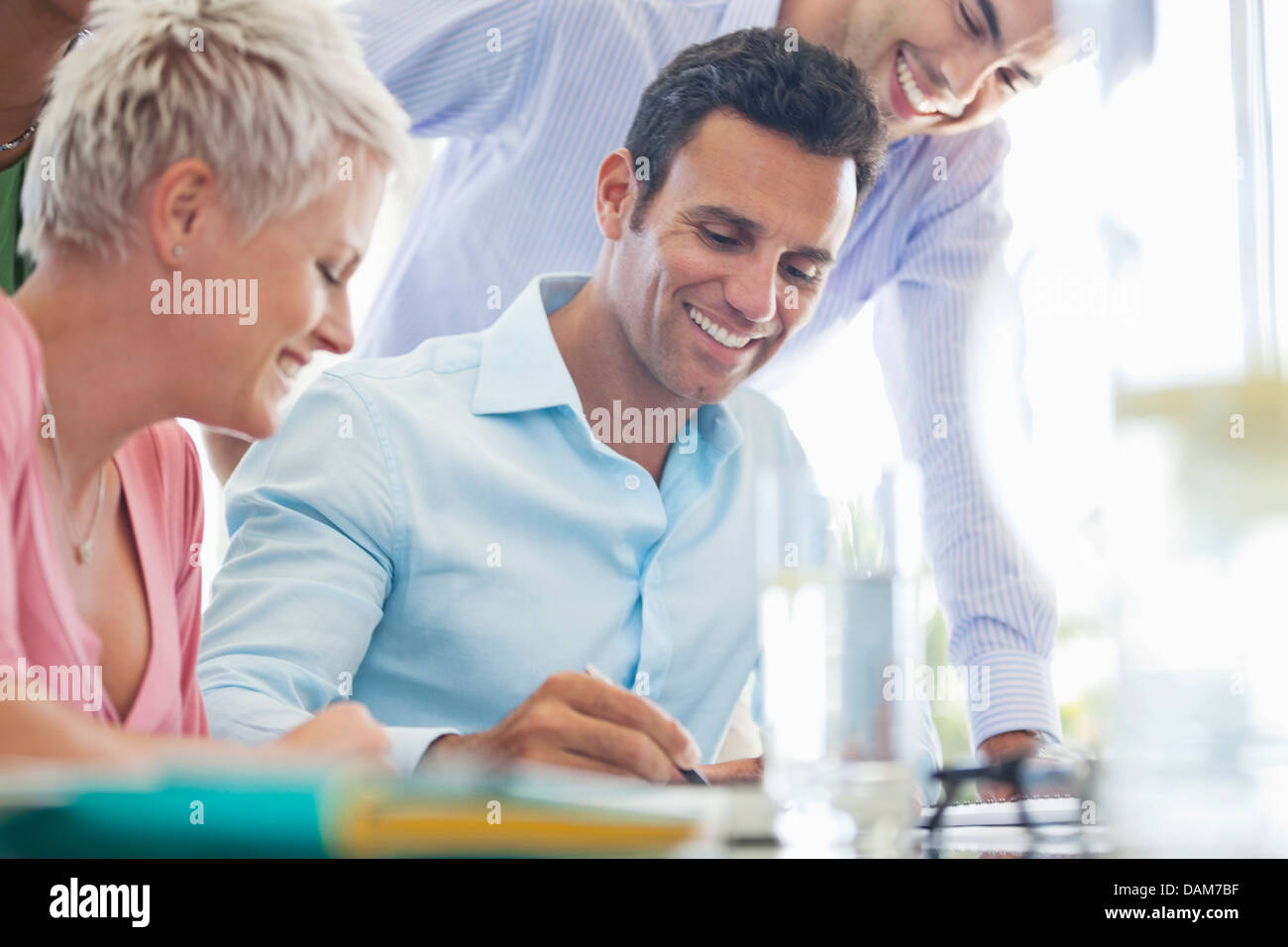 Signing contract office hi-res stock photography and images - Alamy