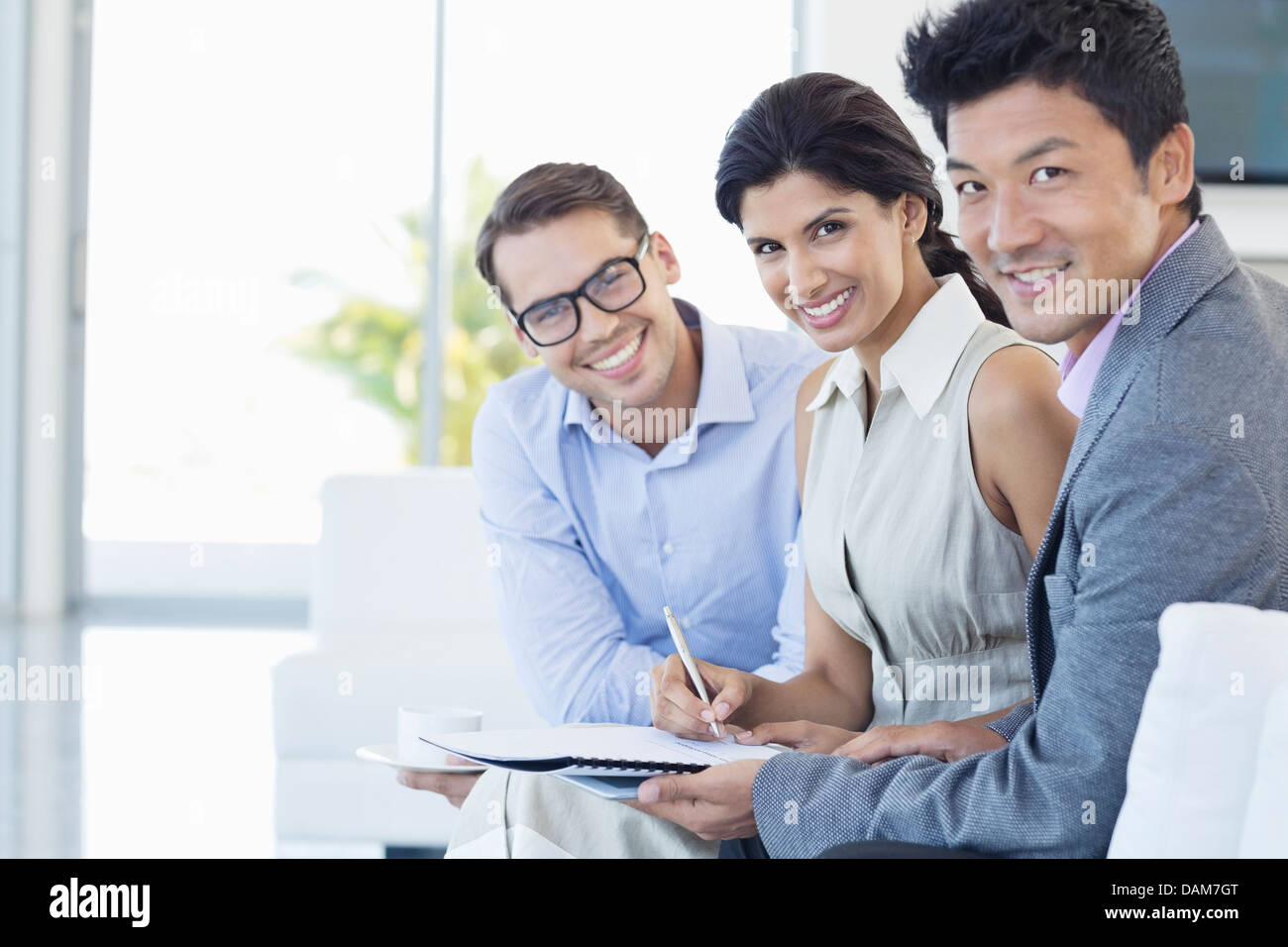 Smiling business woman pen hi-res stock photography and images - Alamy