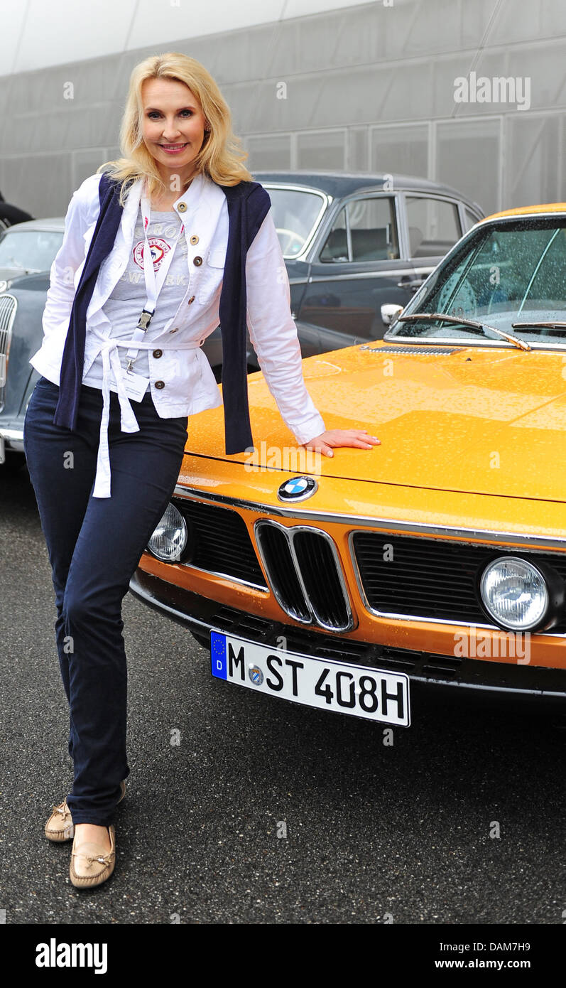 Opera singer Eva Lind poses with a classic car prior to the ...
