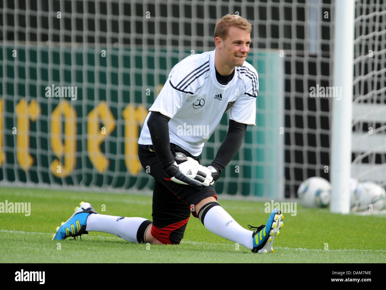 Goalkeeper of the German national soccer team Manuel Neuer stretches ...