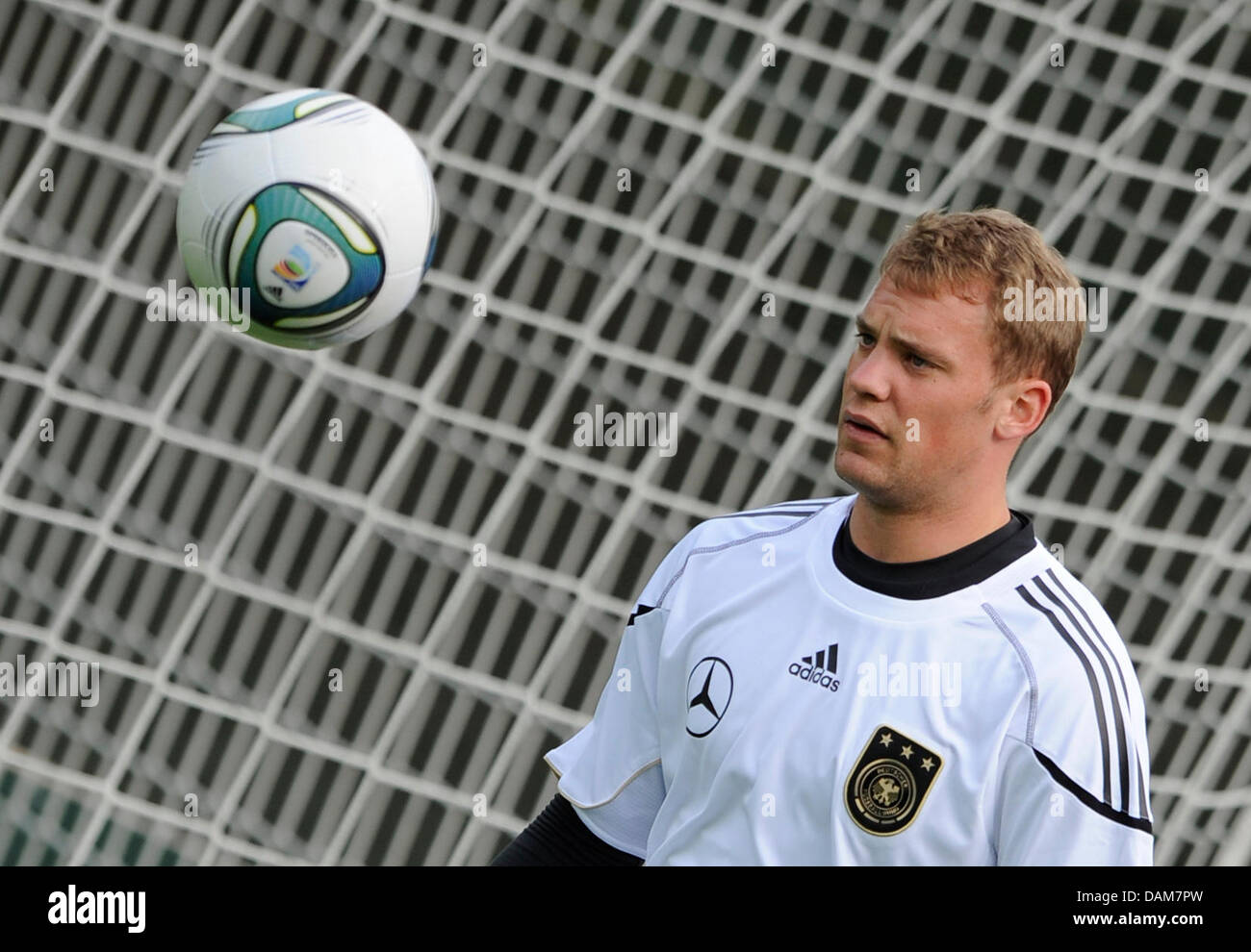 Goalkeeper of the German national soccer team, Manuel Neuer, warms up ...