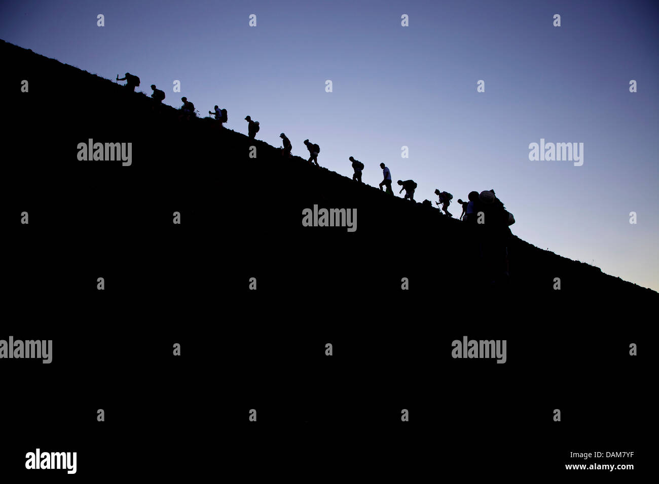 People climbing, hikers in trekking activity on Stromboli, active ...
