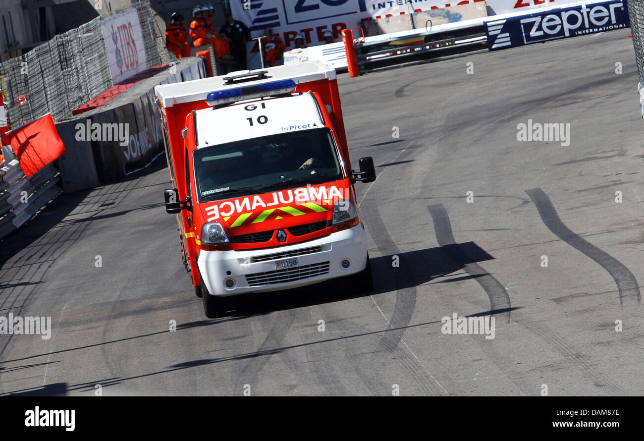 An ambulance transports Mexican Formula One driver Perez of Sauber F1 ...