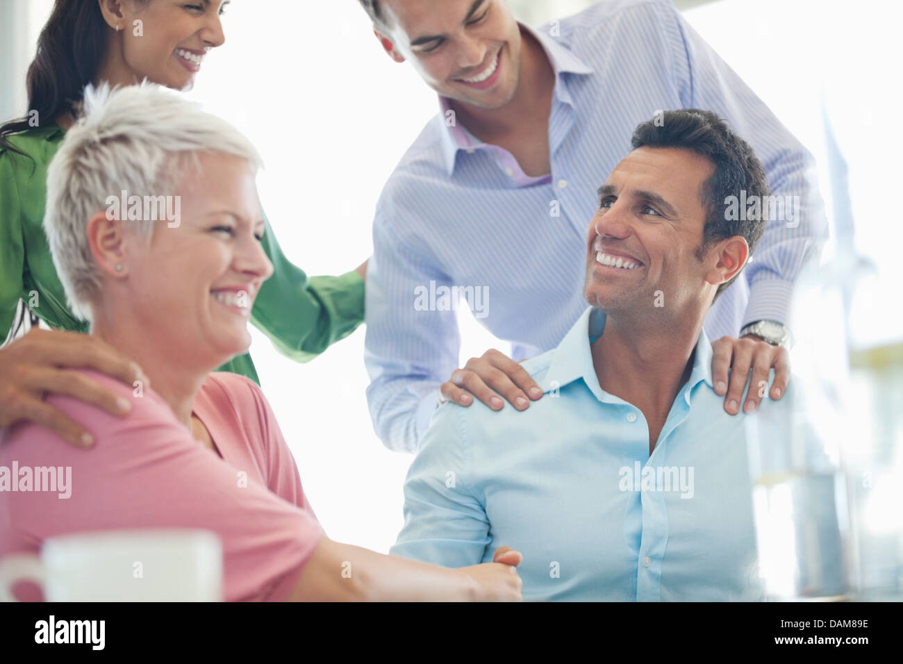 Business people laughing in meeting Stock Photo - Alamy