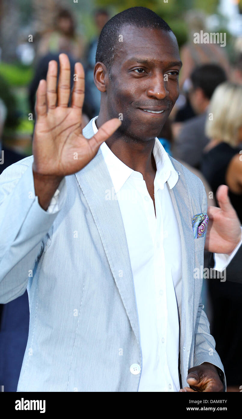 Former US athlete Michael Johnson attends Amber Lounge Fashion Show in ...