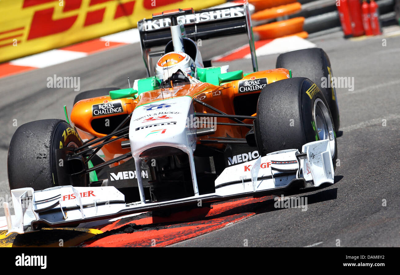 German Formula One driver Adrian Sutil of Force India steers his car ...