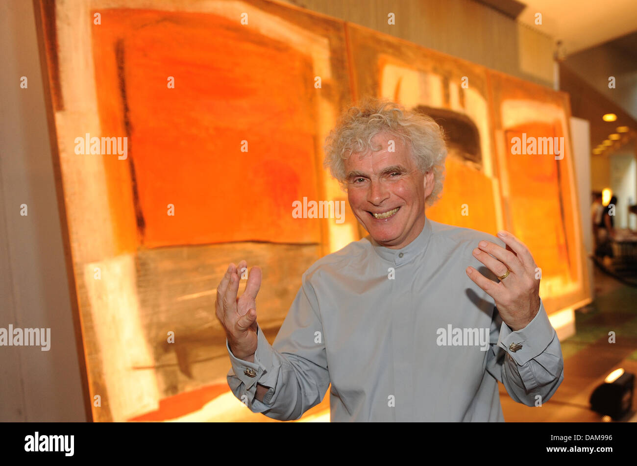 Sir Simon Rattle, star conductor of the Berlin Philharmonic, poses for ...