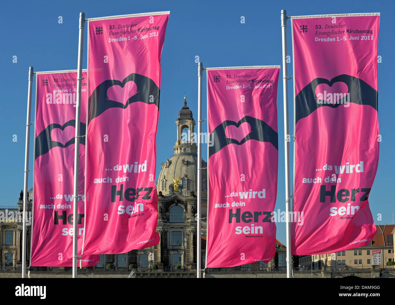 Flags of the Protestant Church Congress stand in front of the Church of ...