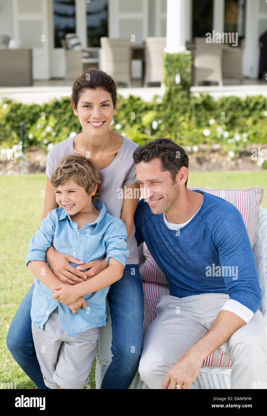 Family standing outside their house hi-res stock photography and images ...