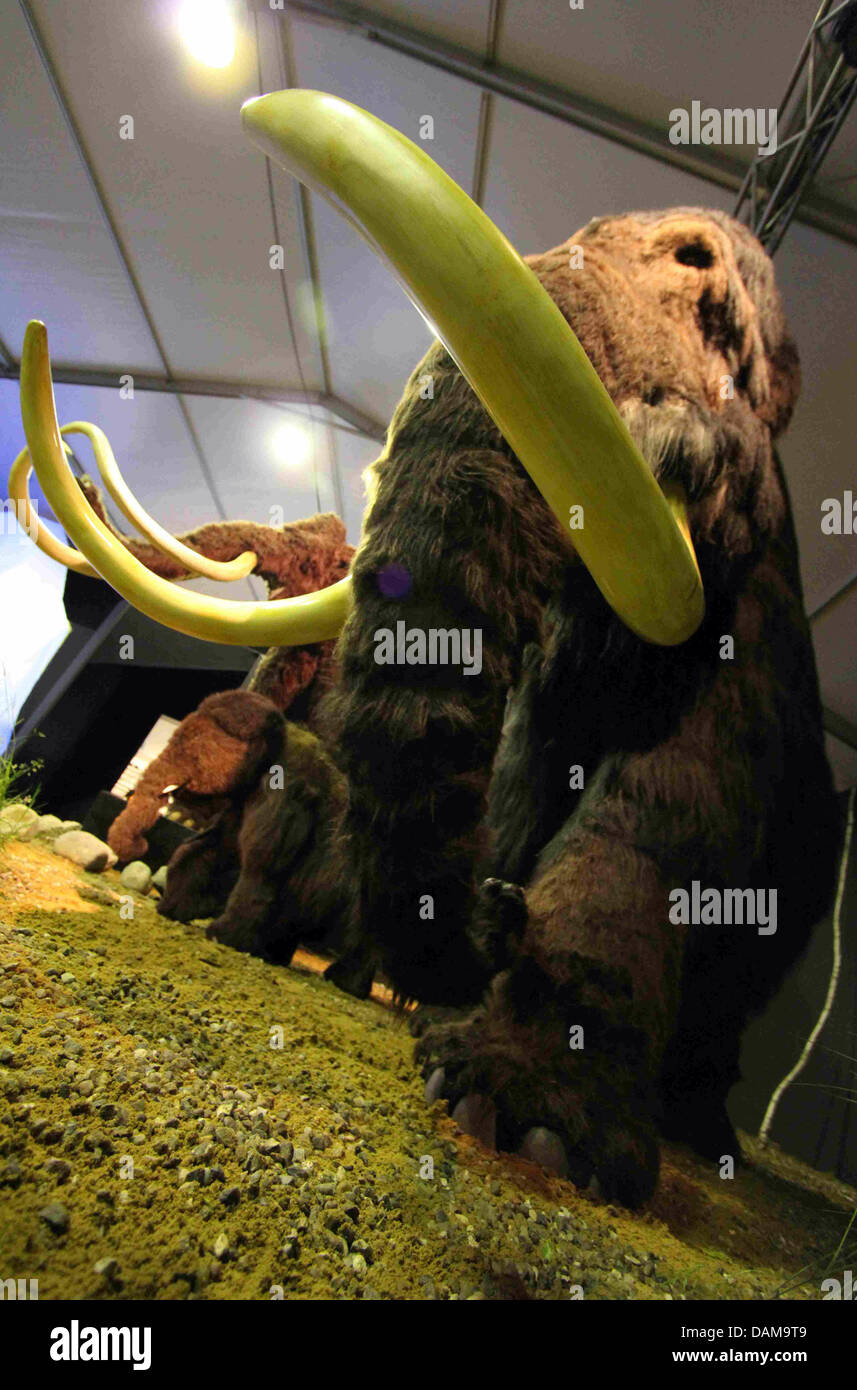 A model of a mammoth stands at the exhibition 'Ice Age Giants ...