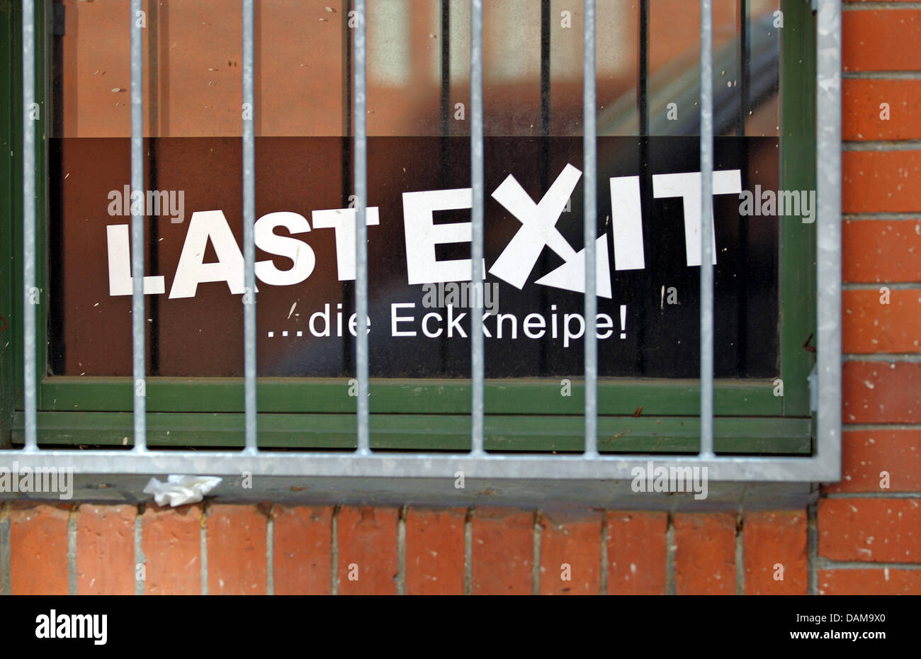 'Last Exit' is written on a bar's window behind bars in Halle, Germany ...