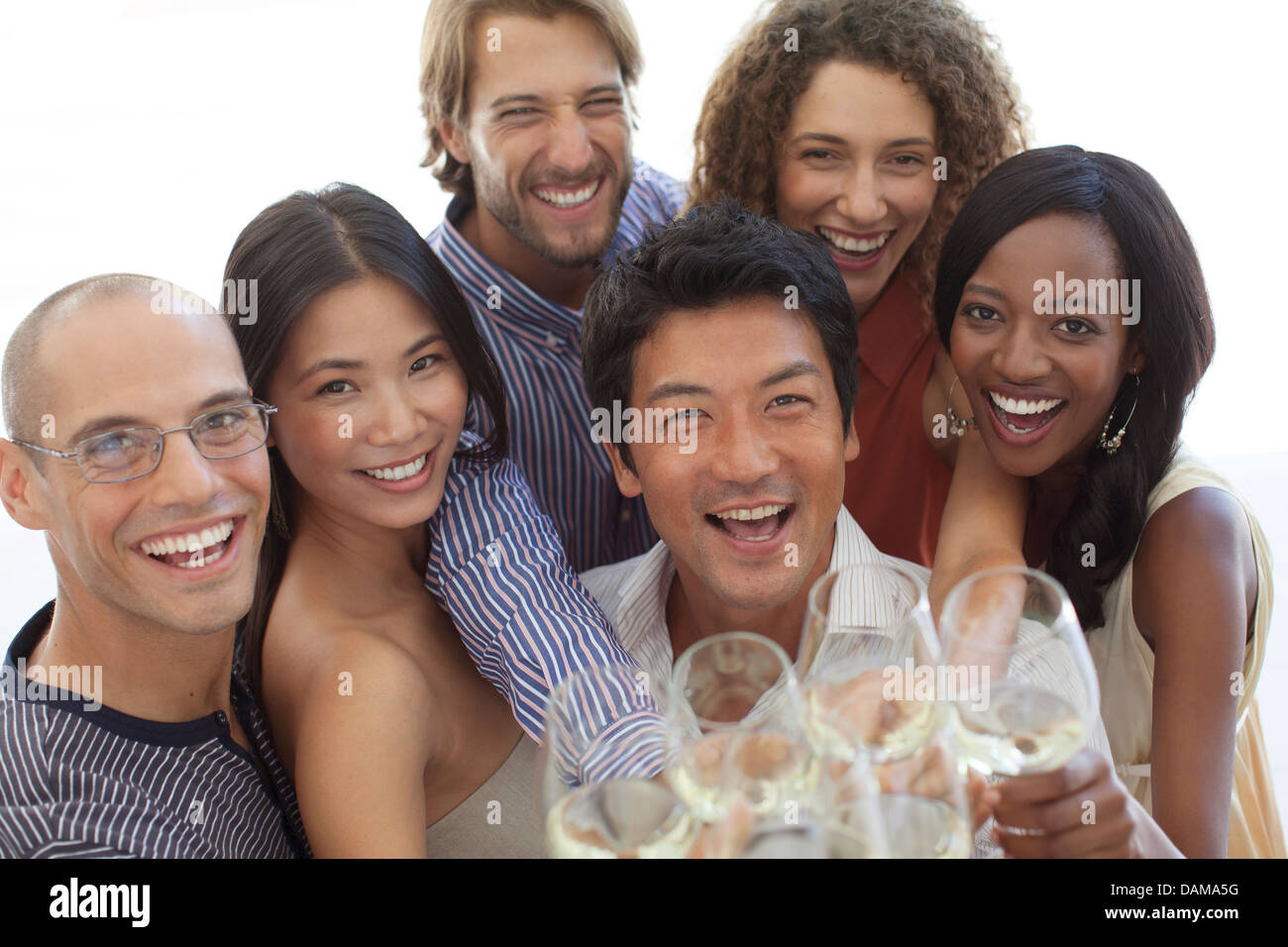 Friends toasting each other at party Stock Photo - Alamy