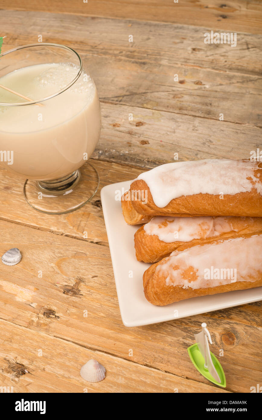 Fartons with horchata, a traditional Spanish summer snack Stock Photo ...