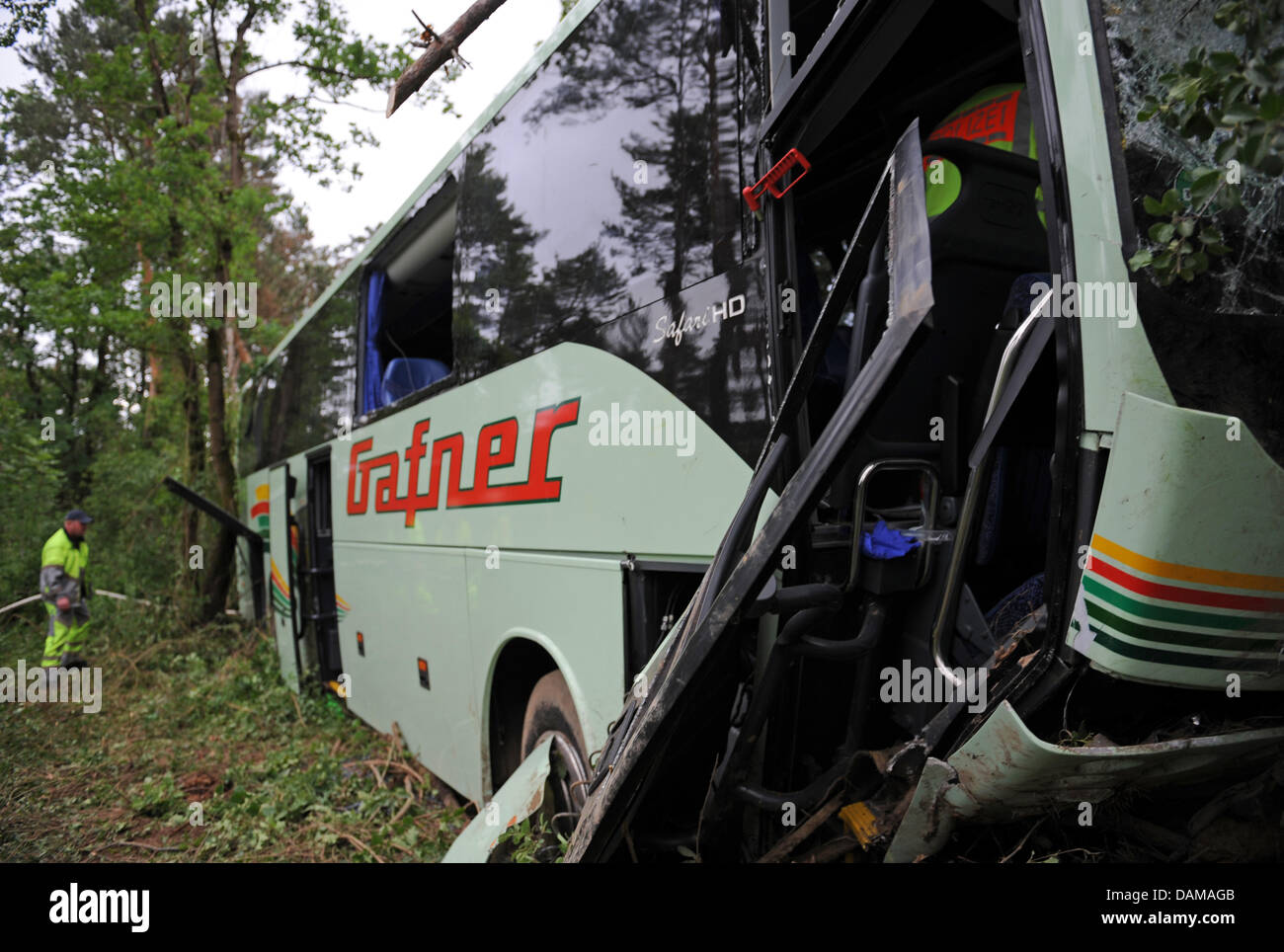 After the bus accident the destroyed bus stands at the Autobahn A5 near ...