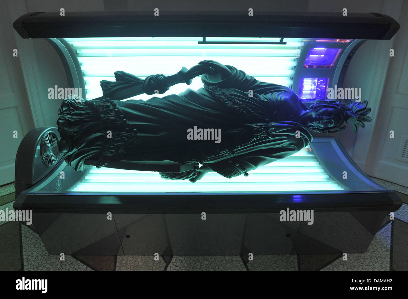 The work of art 'Armed freedom lying on a sunbed' by the artists ...