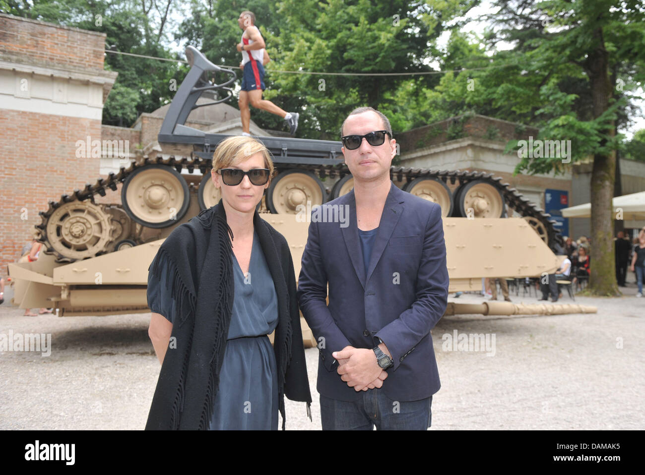 Artist duo Jennifer Allora and Guillermo Calzadilla stand in front of ...