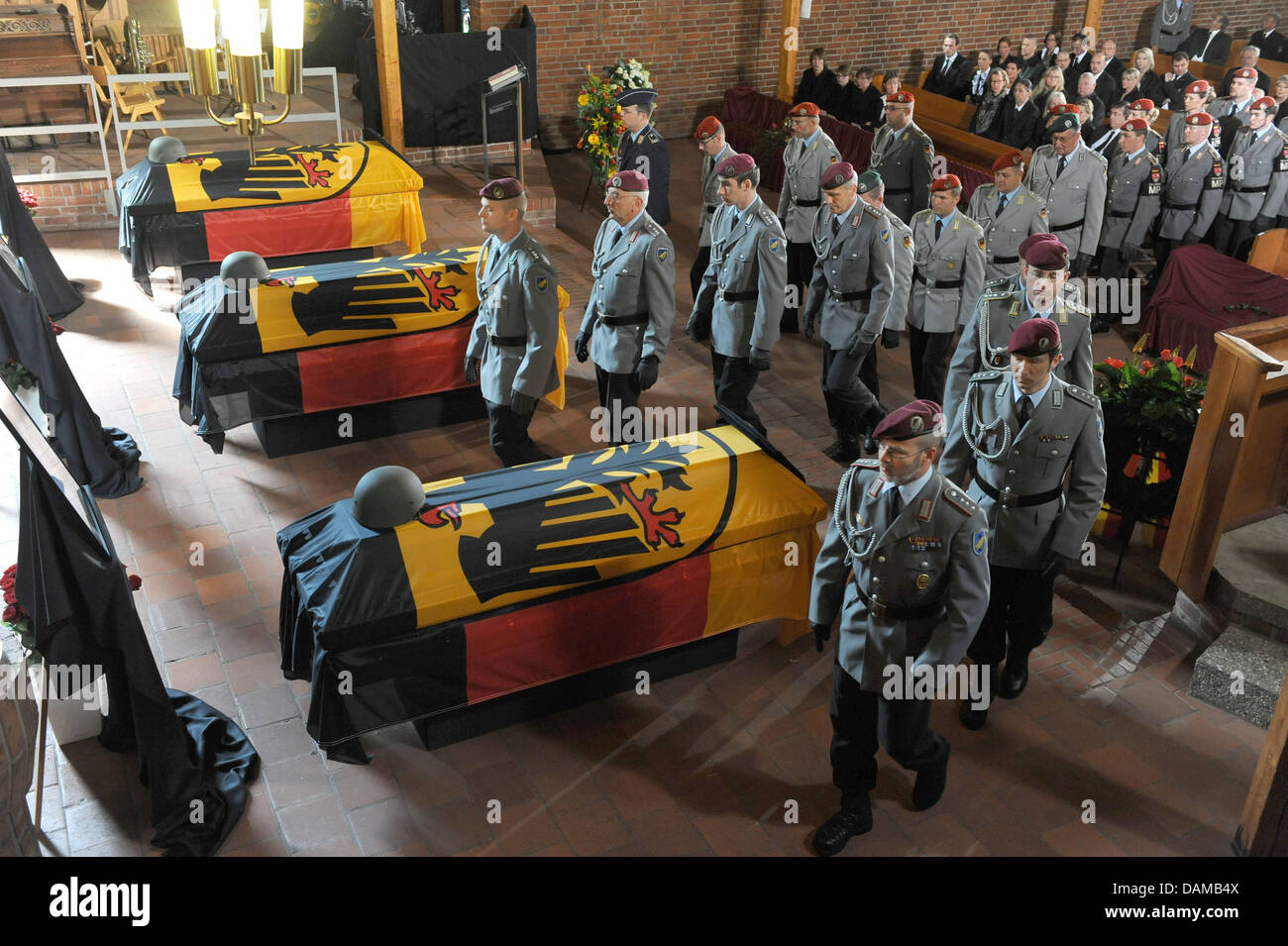 Coffins of three soldiers of the German Bundeswehr, that died during ...