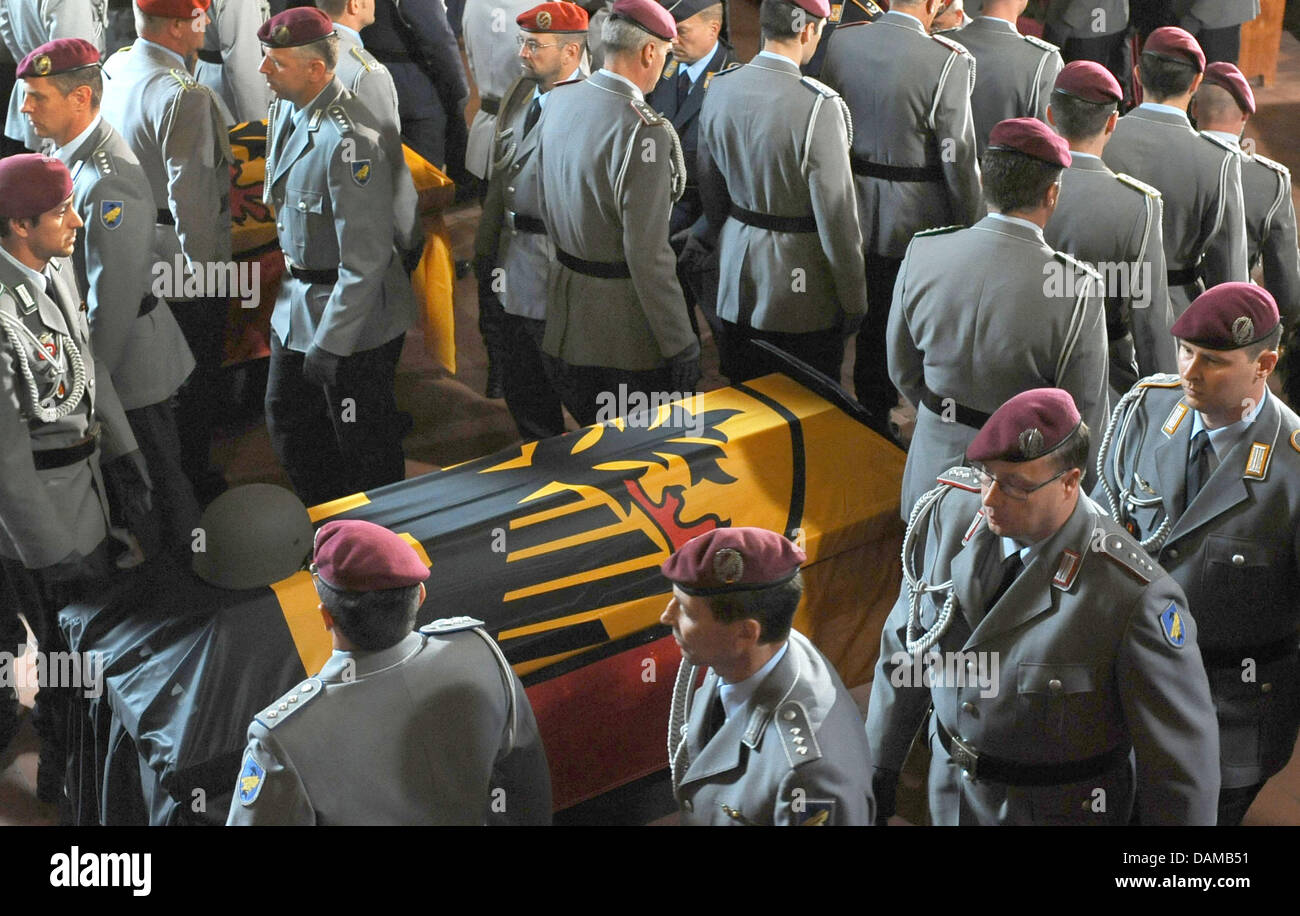 Coffins of three soldiers of the German Bundeswehr, that died during ...