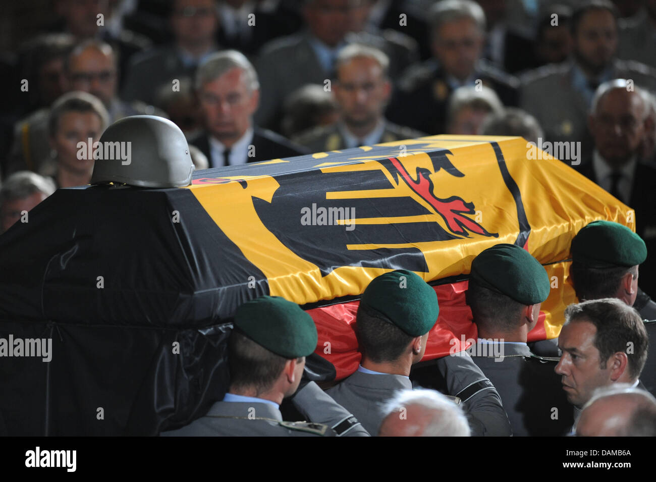 The coffins of three soldiers of the German Bundeswehr that died during ...