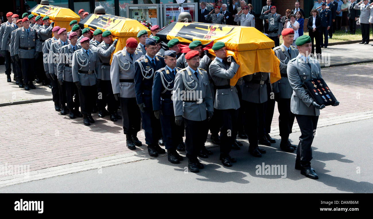 The coffins of three soldiers of the German Bundeswehr that died during ...