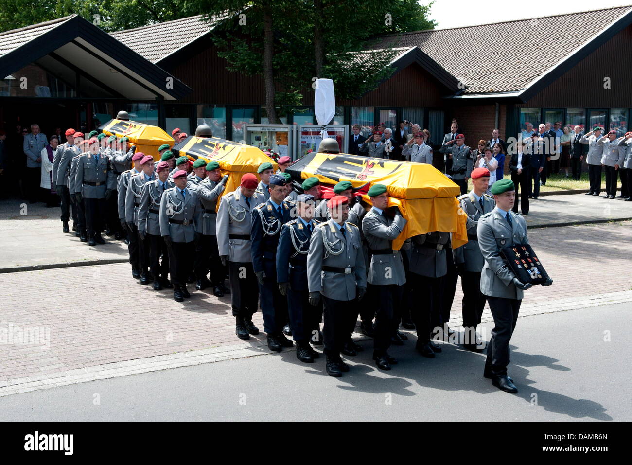 The coffins of three soldiers of the German Bundeswehr that died during ...