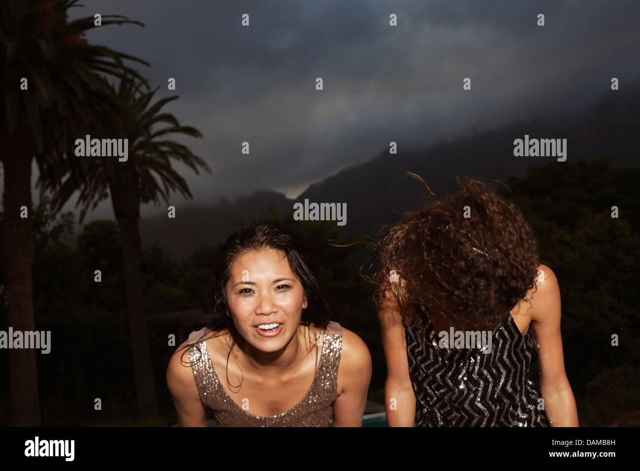 Women standing outside in storm Stock Photo - Alamy