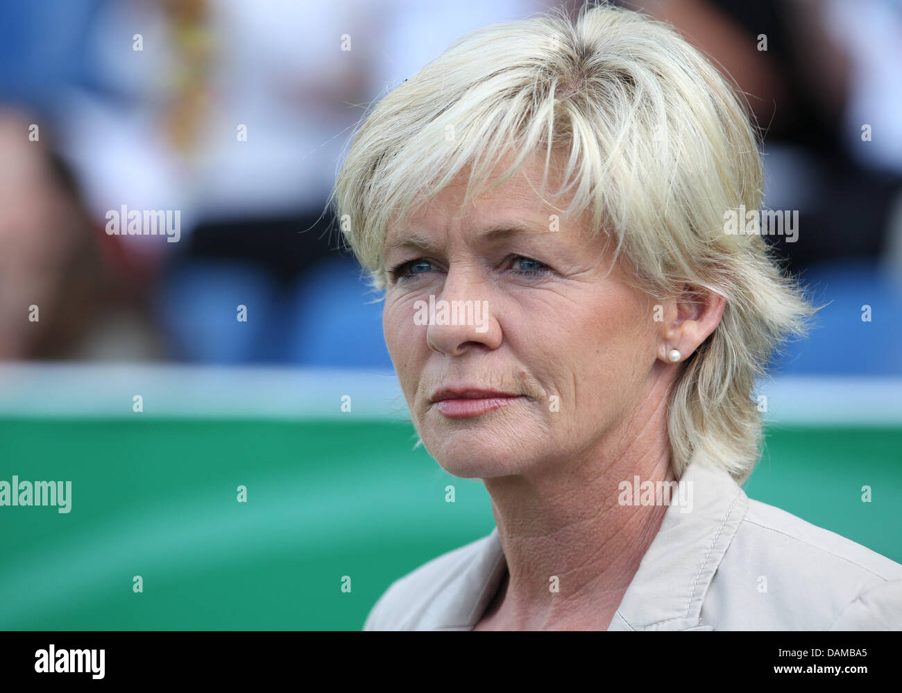 Germany's head coach Silvia Neid looks at the pitch during the ...