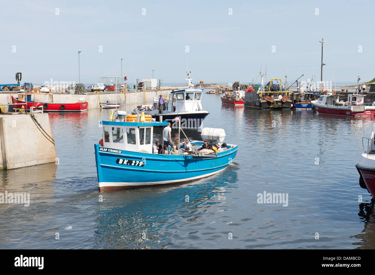 Seahouses Harbour with the boats and tourists for the Farne Islands ...