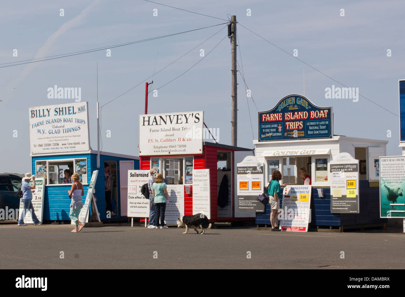 Seahouses Harbour with the ticket booths for boat trips for the Farne ...