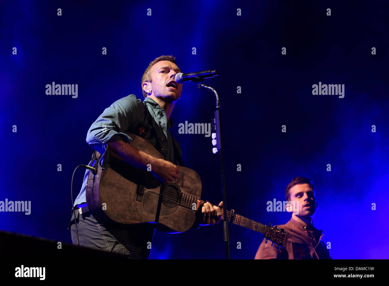 Chris Martin (L), frontman of the British rock band 'Coldplay' performs ...