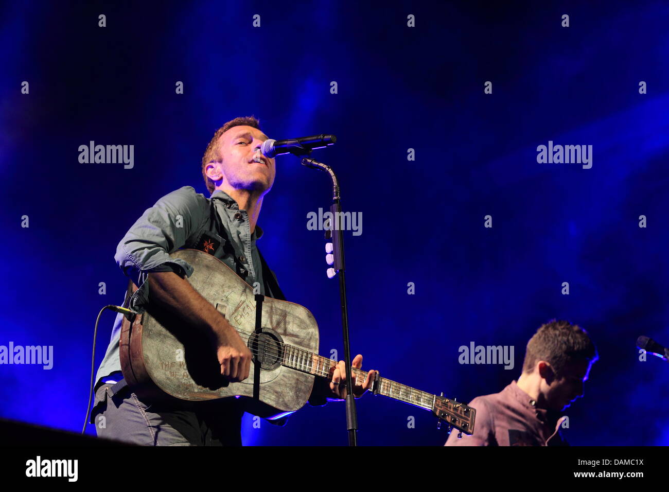 Chris Martin (L), frontman of the British rock band 'Coldplay' performs ...