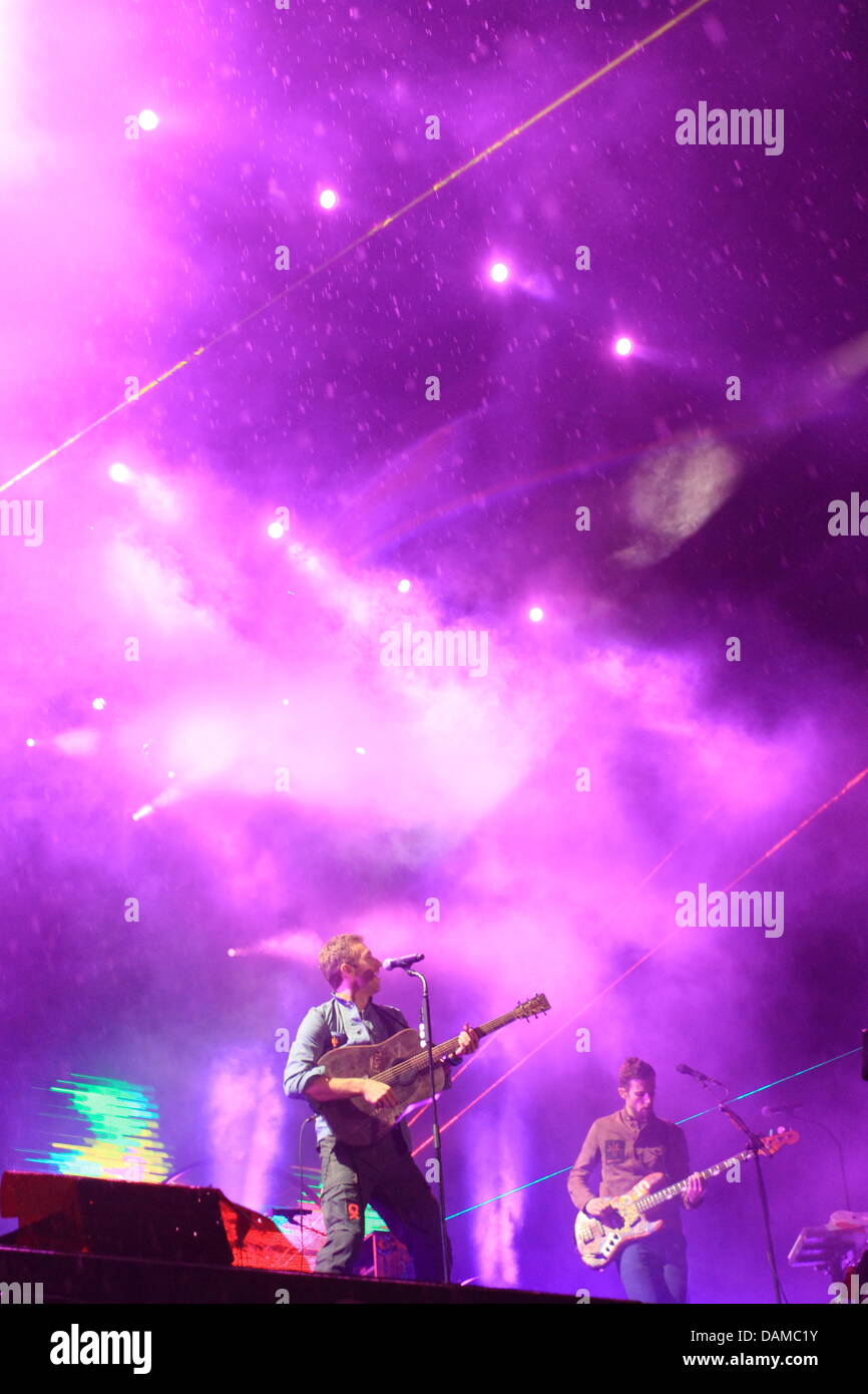 Chris Martin (L), frontman of the British rock band 'Coldplay' performs ...