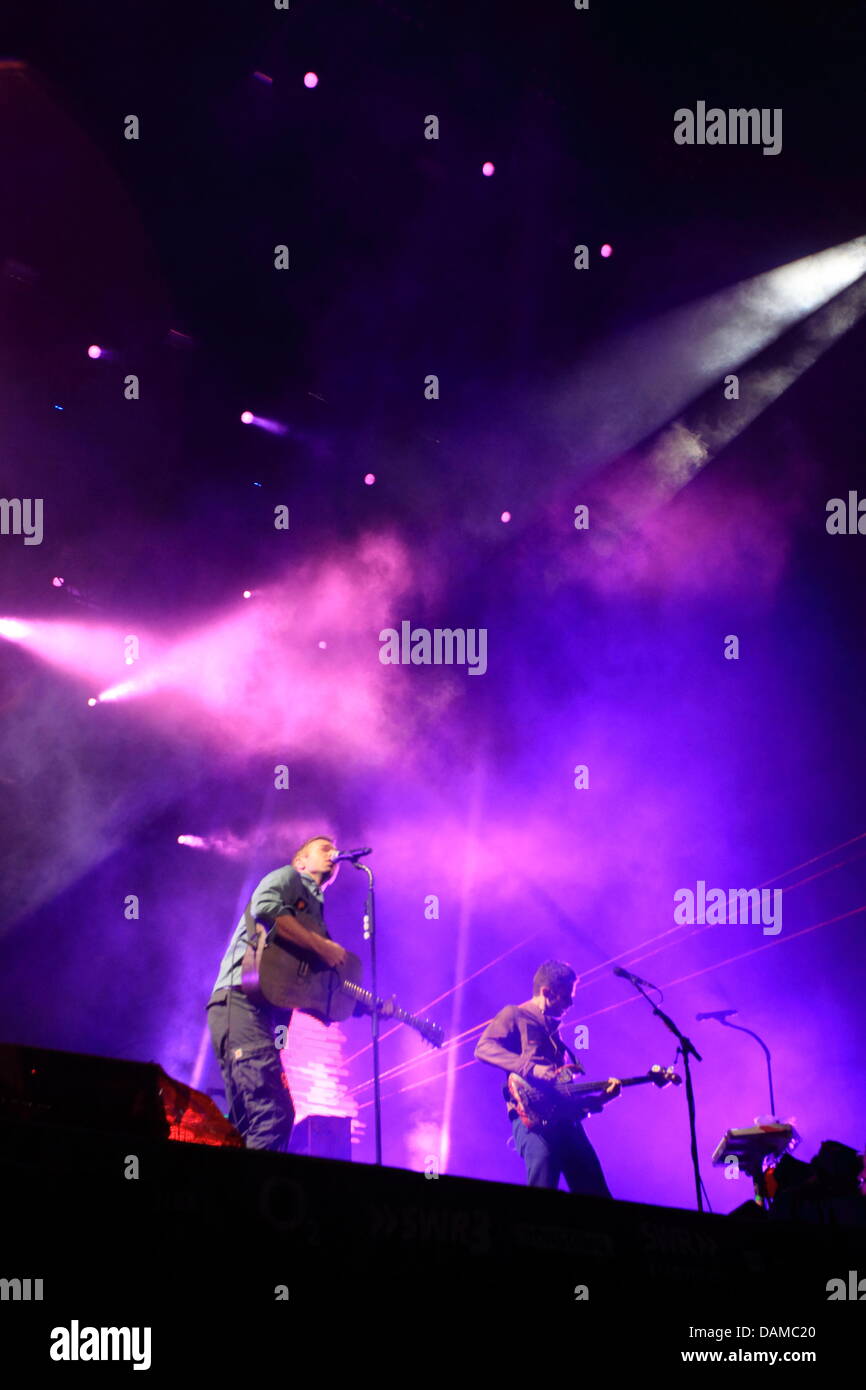 Chris Martin (L), frontman of the British rock band 'Coldplay' performs ...