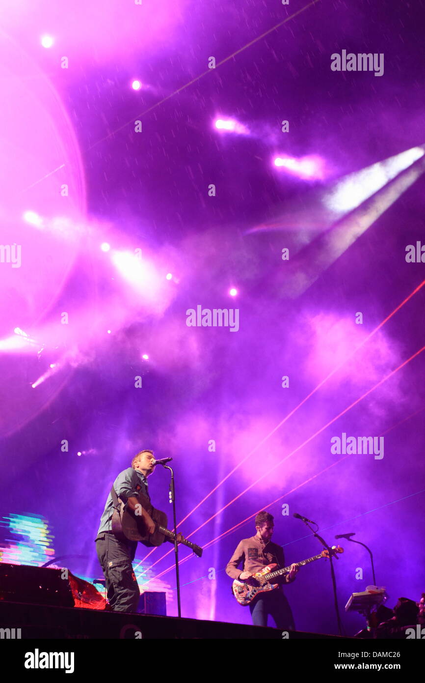 Chris Martin (L), frontman of the British rock band 'Coldplay' performs ...