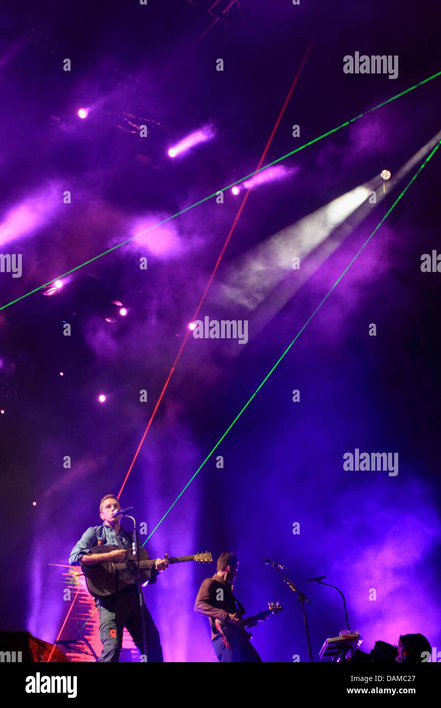 Chris Martin (L), frontman of the British rock band 'Coldplay' performs ...