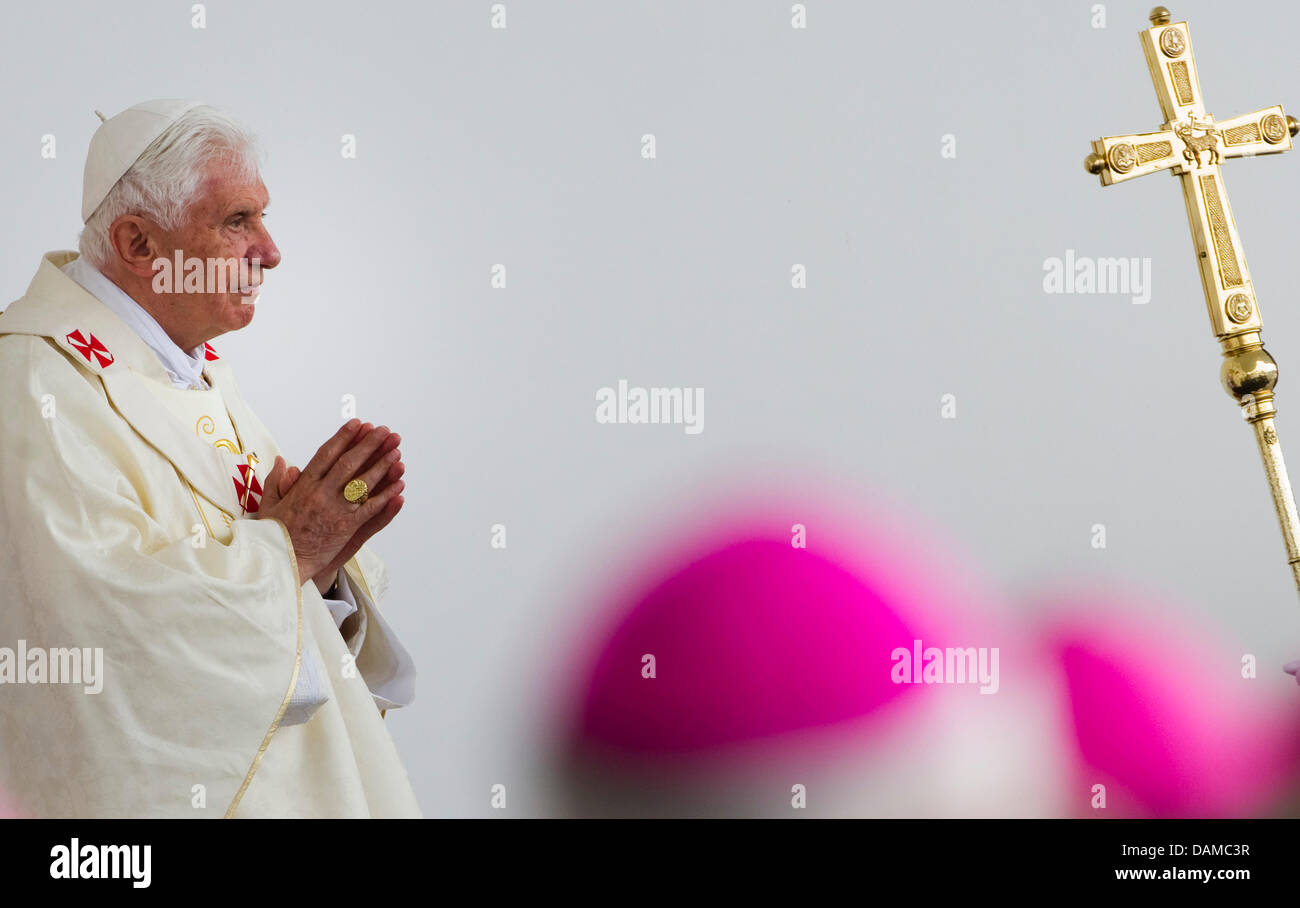 Pope Benedict XVI prays during a mass held at Zagreb hippodrome on the ...