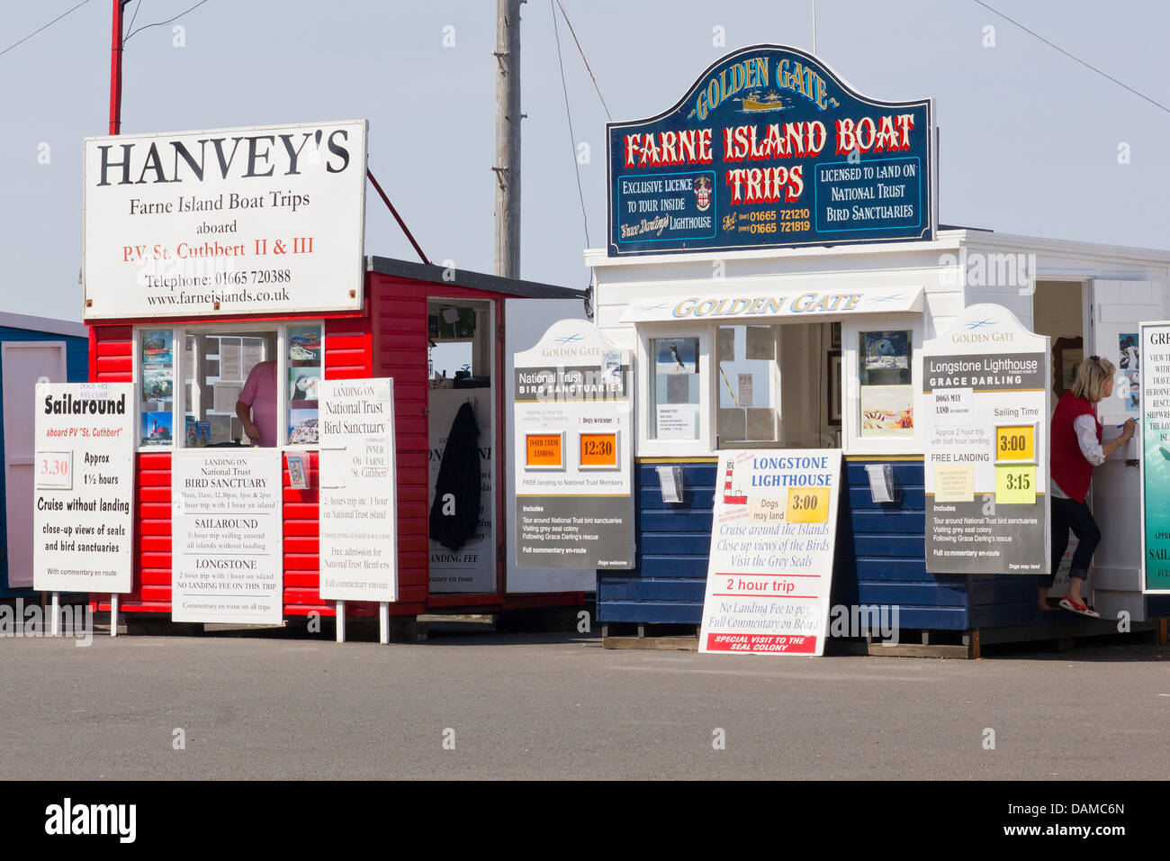 Seahouses Harbour with the ticket booths for boat trips for the Farne ...