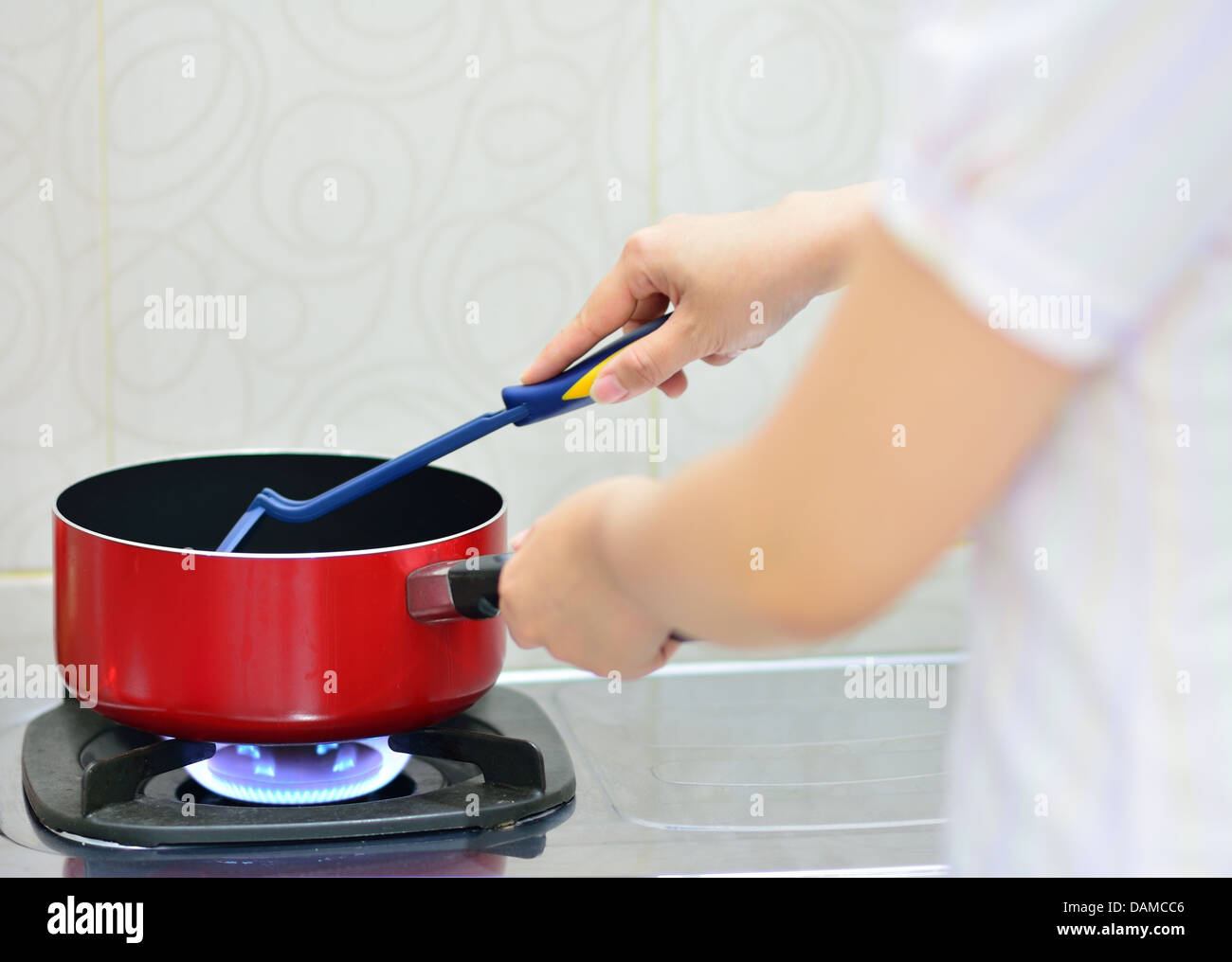 cooking in the kitchen Stock Photo - Alamy