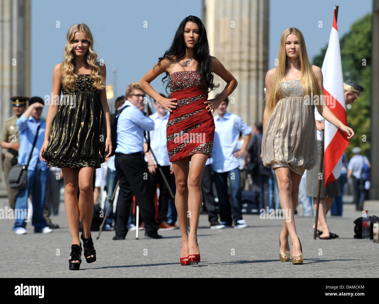With 'German flag'-dresses in black, red and gold, the models Jana (L-R ...