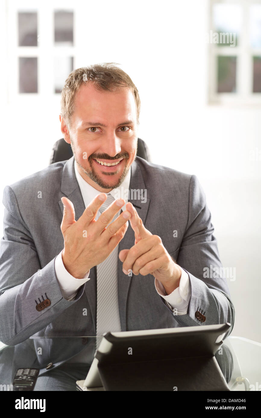 Germany, Portrait of businessman, smiling Stock Photo - Alamy