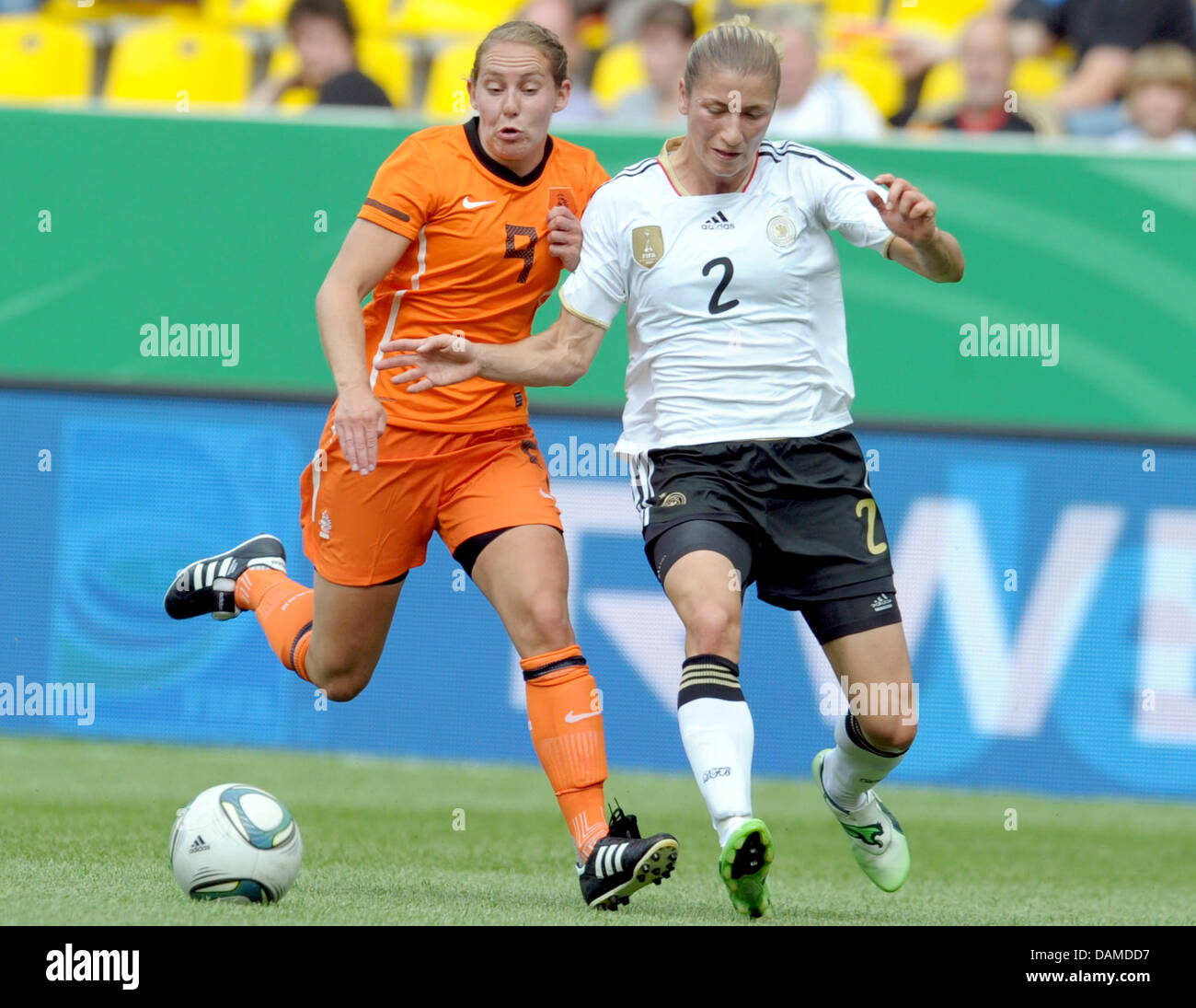 German player Bianca Schmidt (R) and Dutch player Manon Melis vie for ...