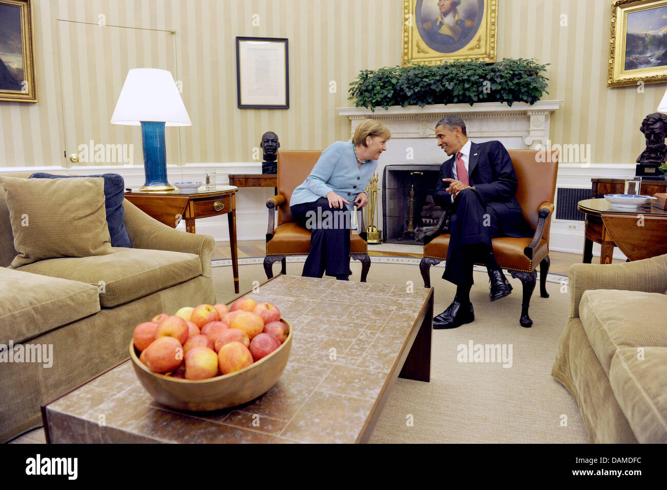 German Chancellor Angela Merkel and US President Barack Obama converse ...