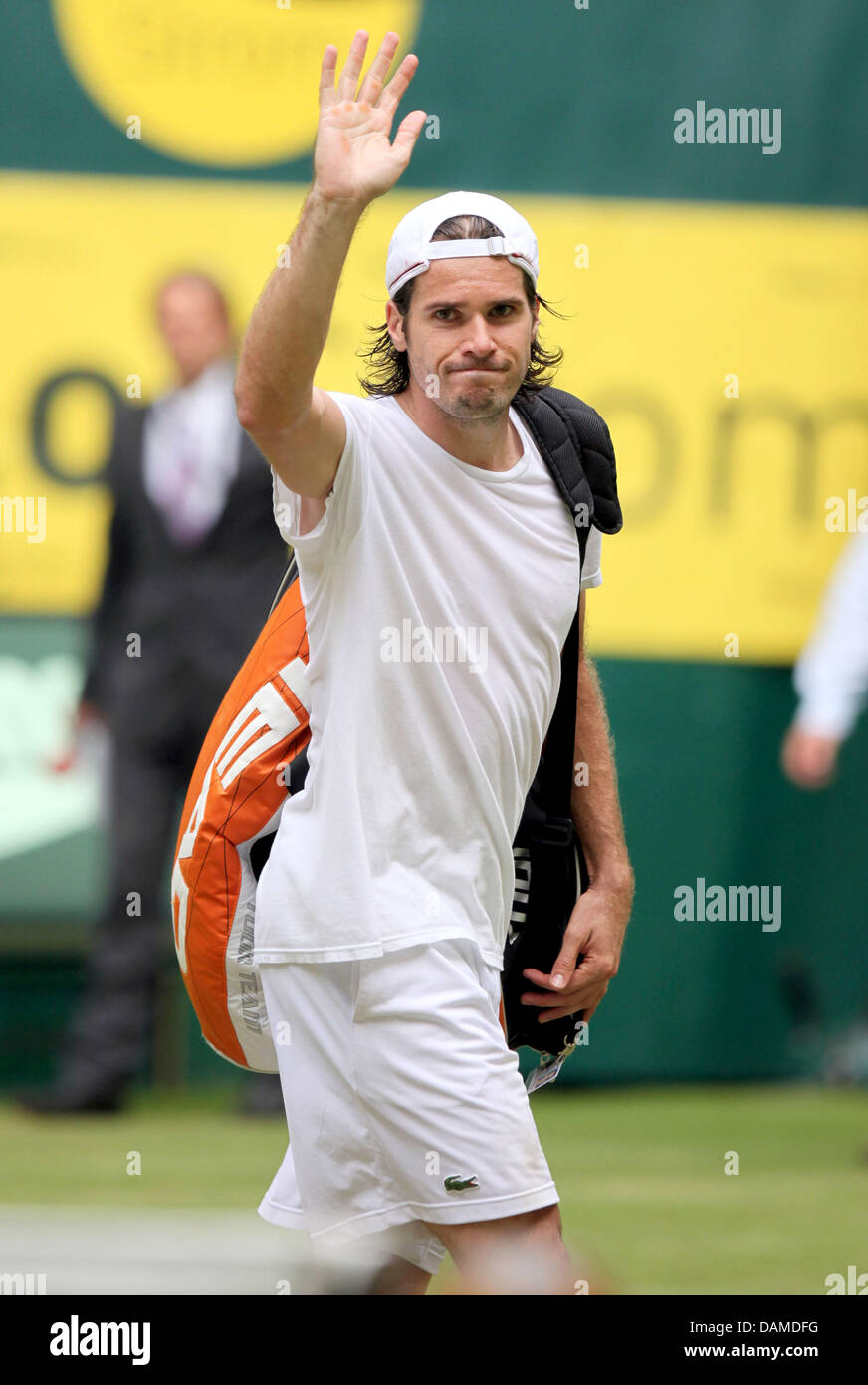 German player Tommy Haas waves after the win in the ATP Tour first ...