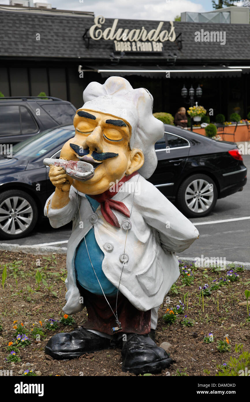 A large advertising model chef outside an Italian restaurant Stock ...