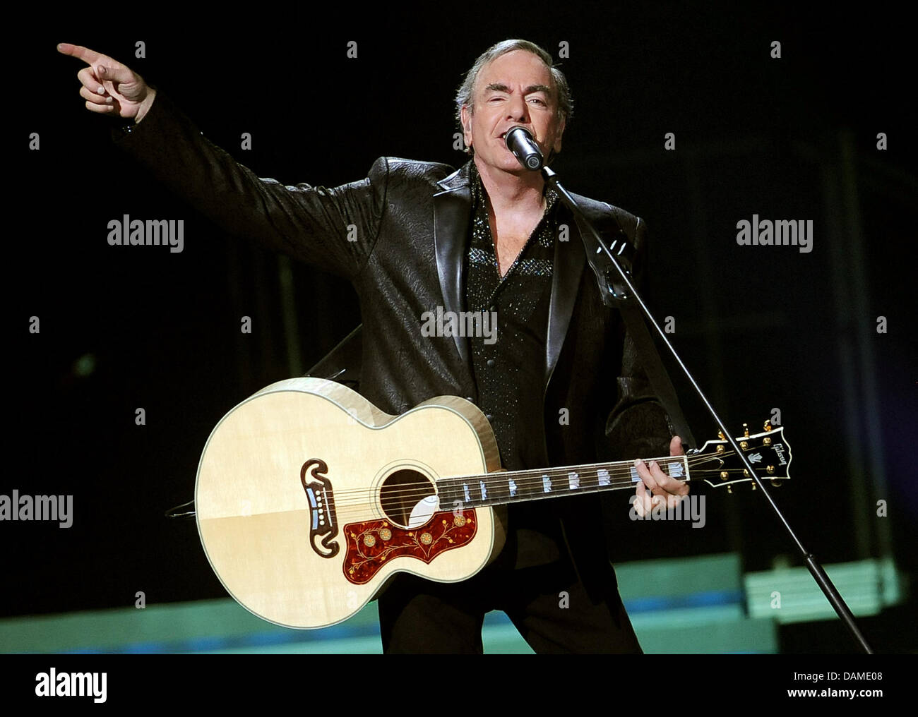 US singer Neil Diamond performs on stage during a concert at the O2 ...