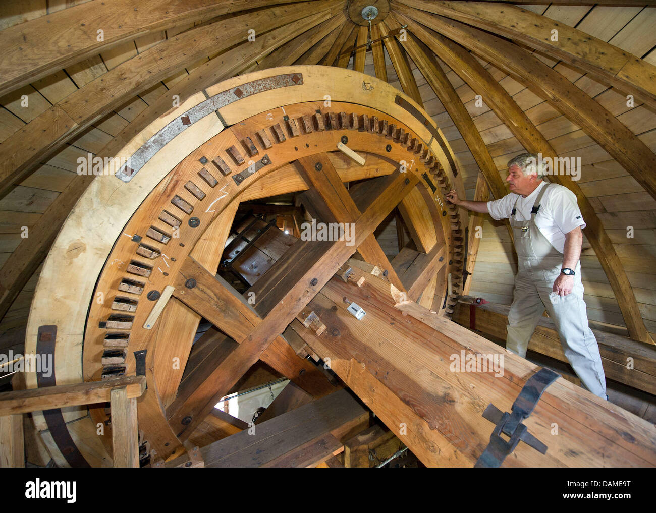 Gerd Nowak of the Mill Club Hollaendermuehle e.v. stands under the roof ...