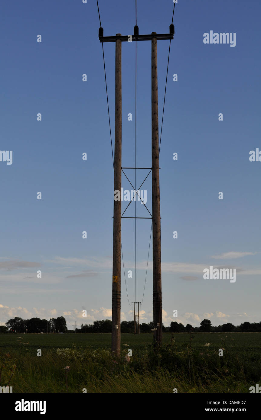 Pylons in a Field Stock Photo - Alamy