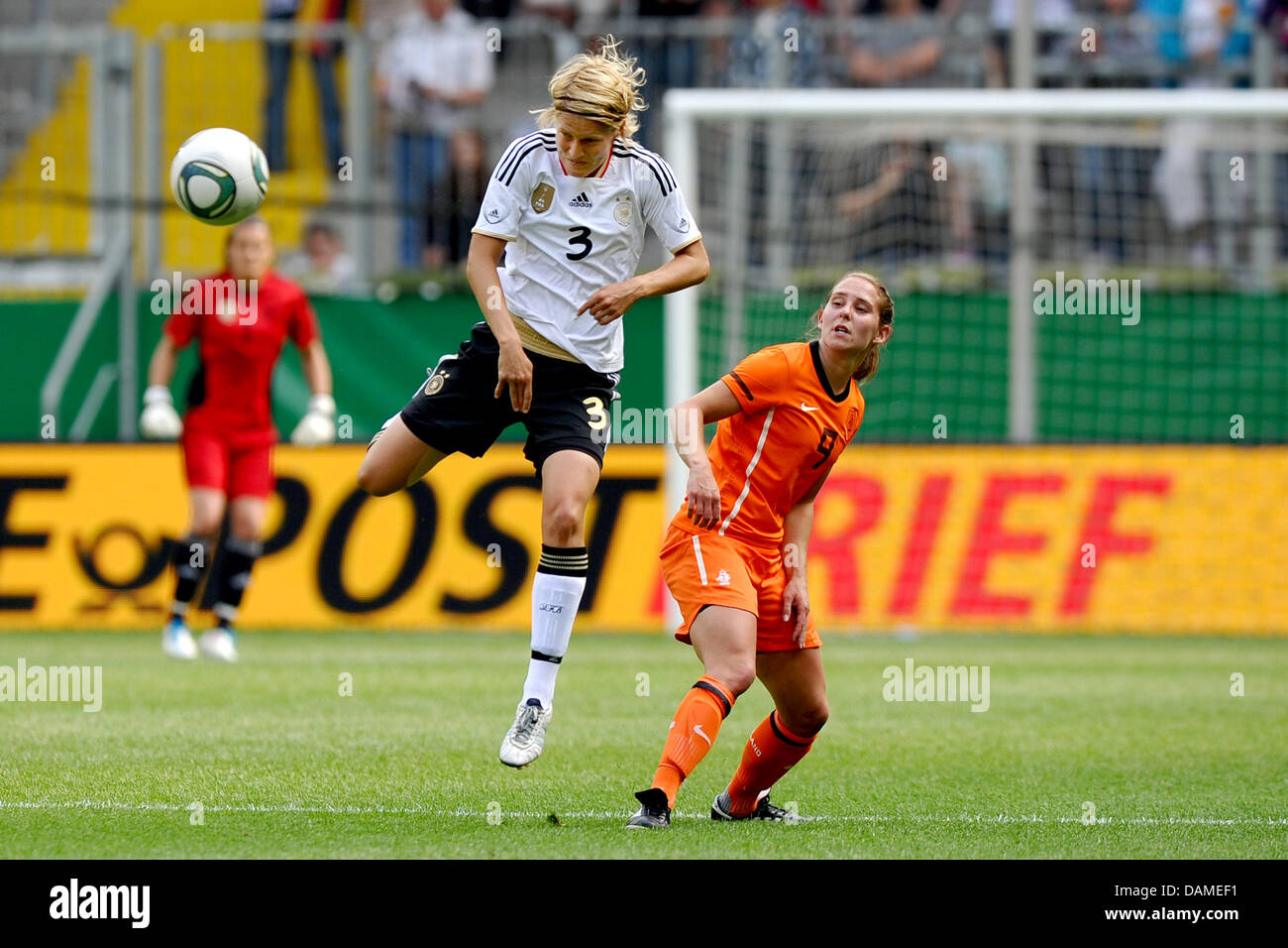 Germany's Saskia Bartusiak (L) vies for the ball with Manon Melis of ...
